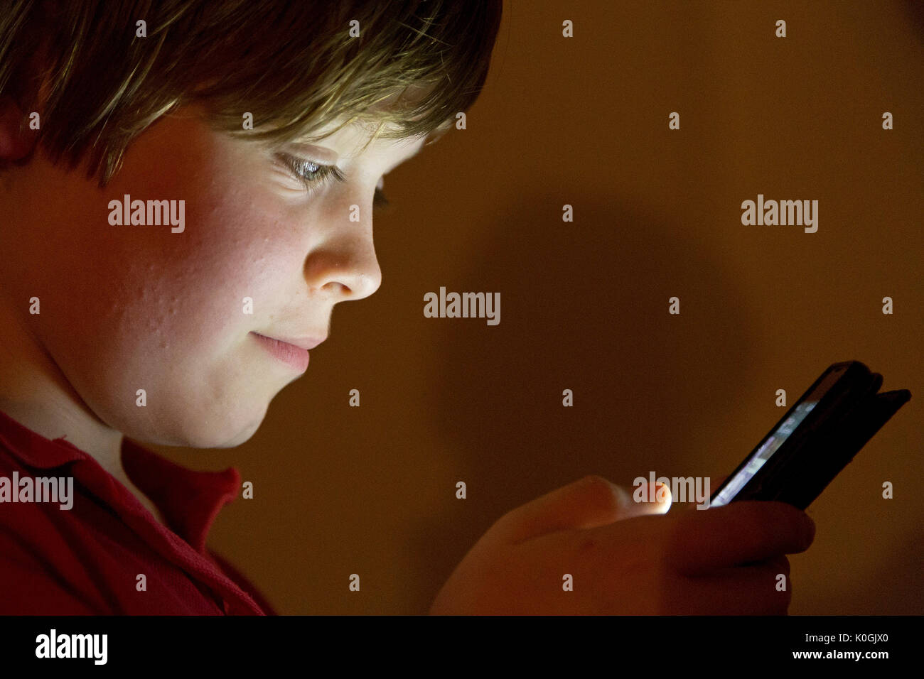 Boy cellular phone hi-res stock photography and images - Alamy