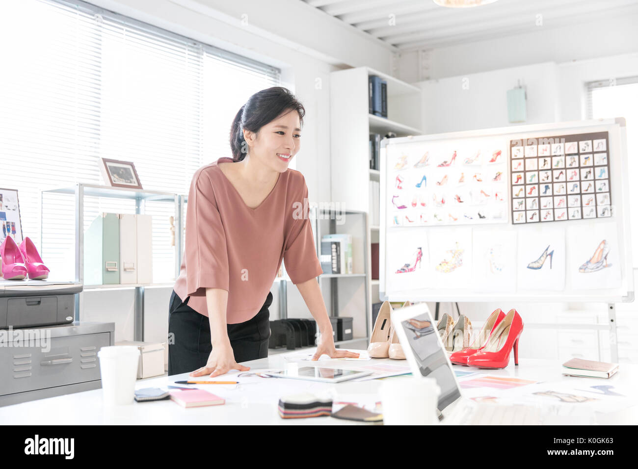 Female office director hi-res stock photography and images - Alamy