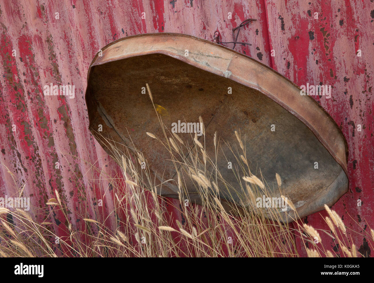 Metal wall, lid and grain Stock Photo - Alamy
