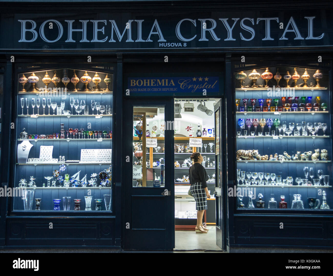 Latin woman buying bohemia crystals in prague hi-res stock photography ...