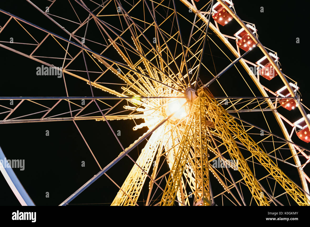Ferris wheel at night in the park, bottom view Stock Photo - Alamy