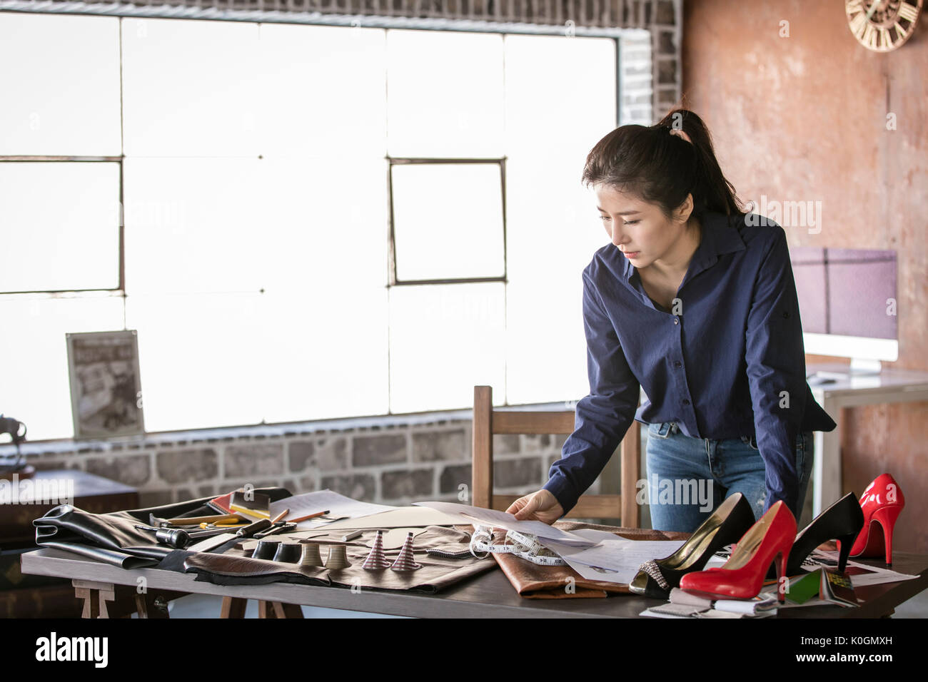 Asian female at work hi-res stock photography and images - Alamy