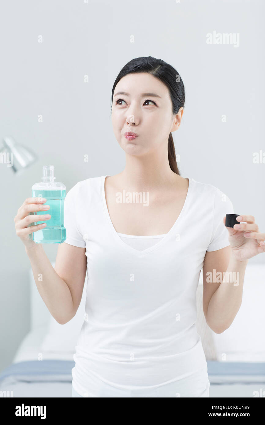Mouthwash female hi-res stock photography and images - Alamy