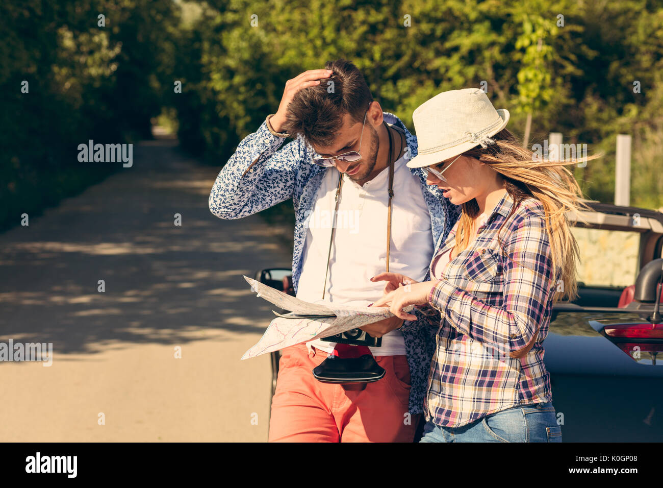 Girl map confused hi-res stock photography and images - Alamy