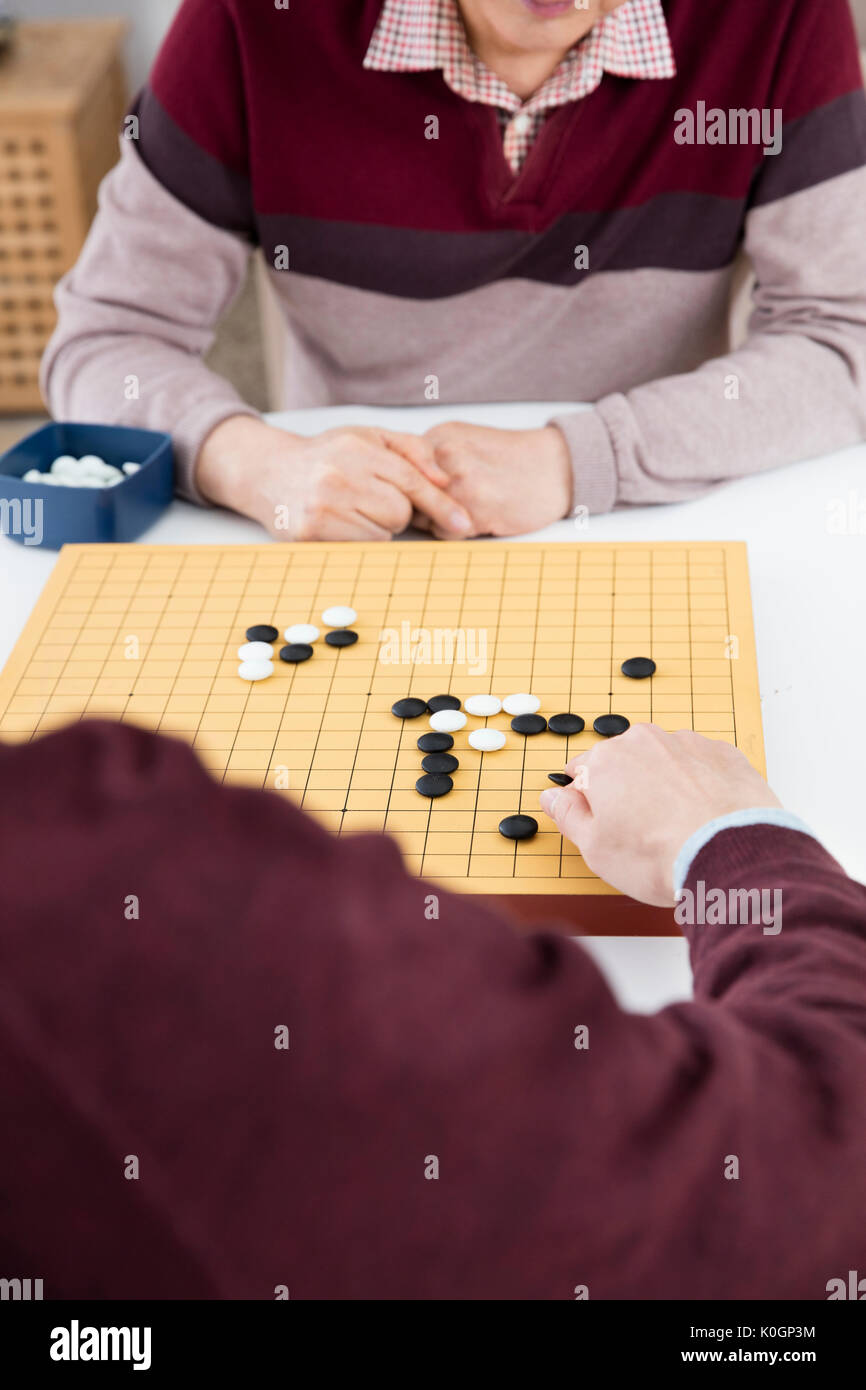Playing go asian hi-res stock photography and images - Alamy