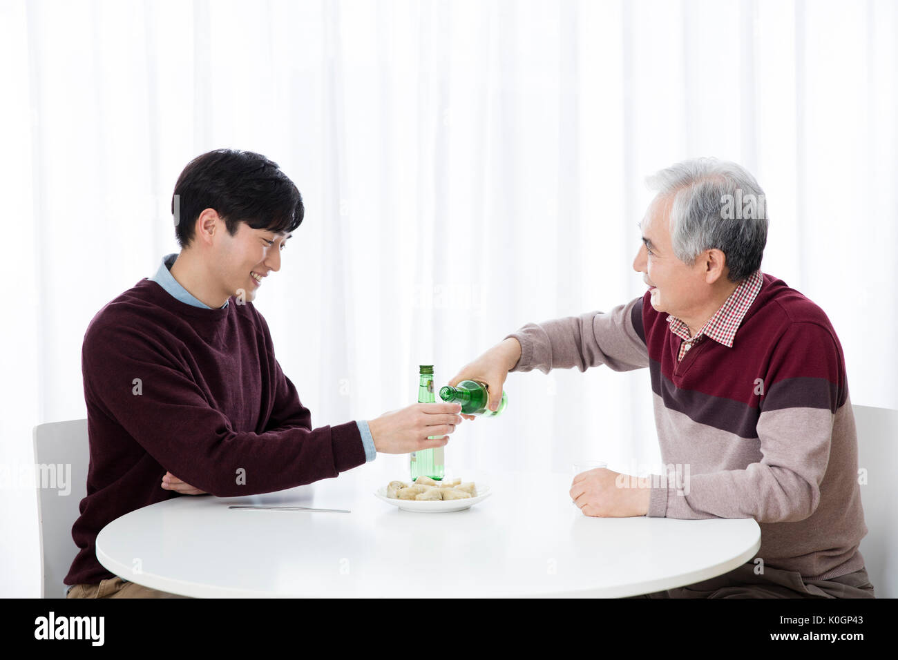 Father son drinking alcohol hi-res stock photography and images - Alamy