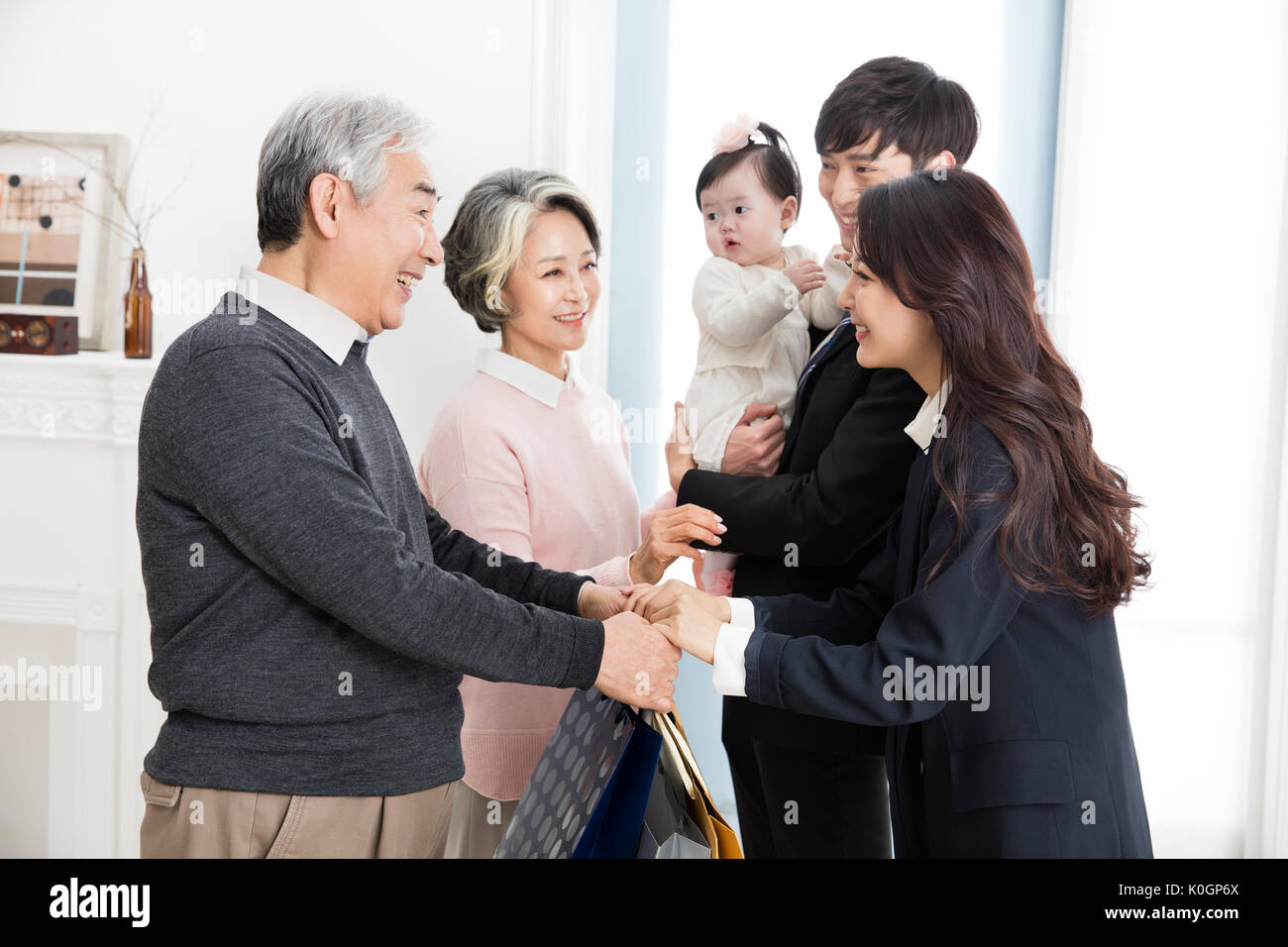 Asian harmonious family with baby hi-res stock photography and images ...