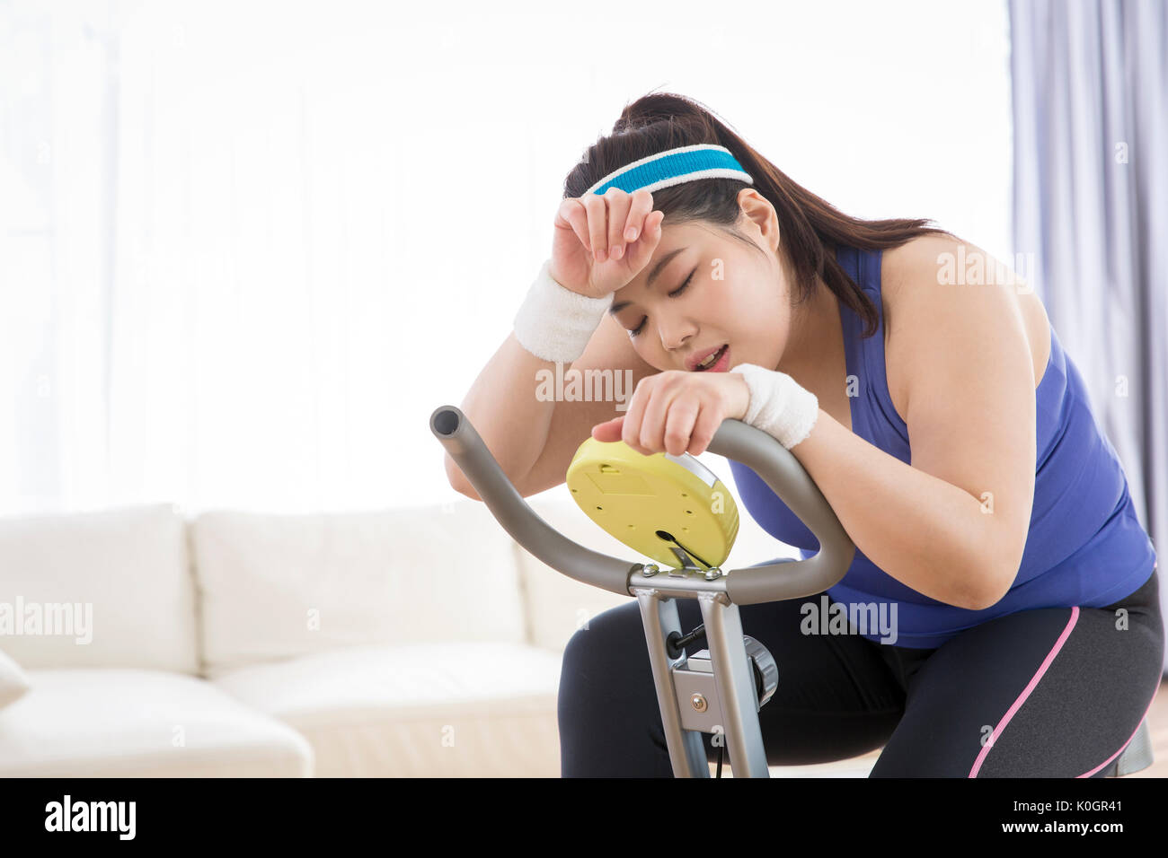 Young fat woman tired exercising Stock Photo - Alamy