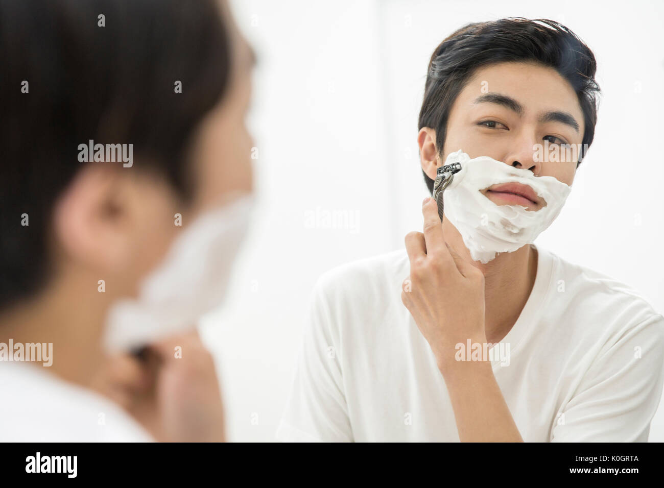 Portrait of smiling grooming shaving his face Stock Photo - Alamy