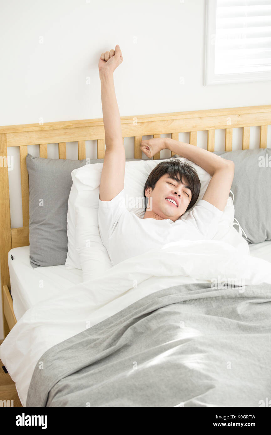 Person lying down arms up hi-res stock photography and images - Alamy