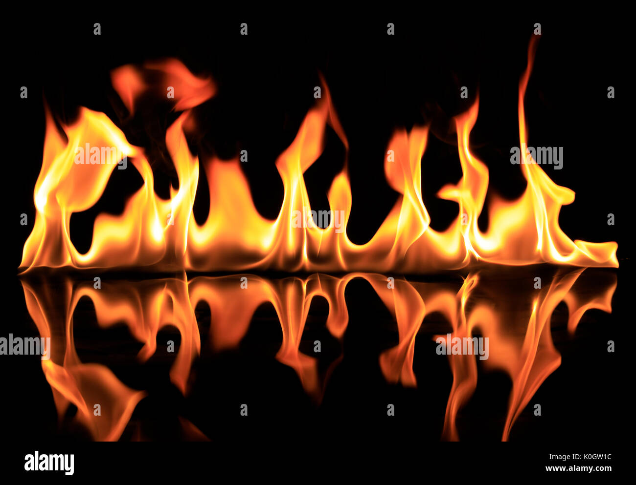 Fire on black background, hot, heat Stock Photo - Alamy