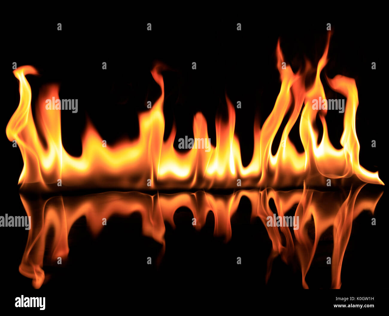Fire on black background, hot, heat Stock Photo - Alamy