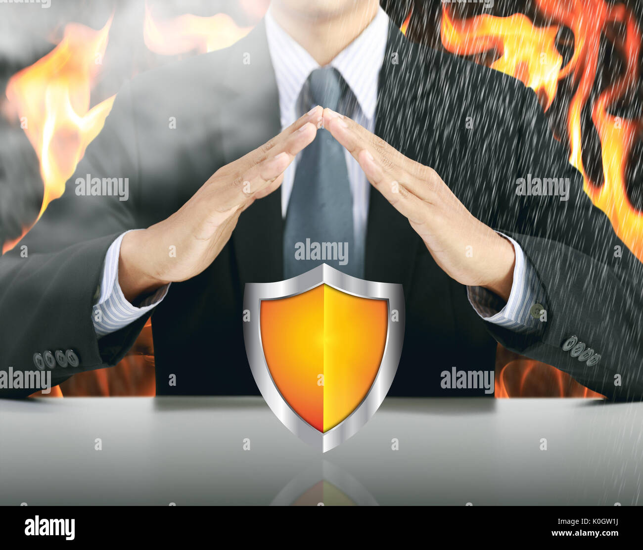 businessman and shield with fire background, insurance concept Stock ...
