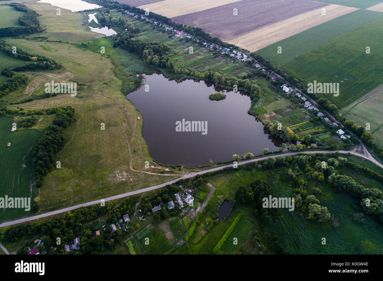 Panoramic view of the valley with green fresh fields and village ...