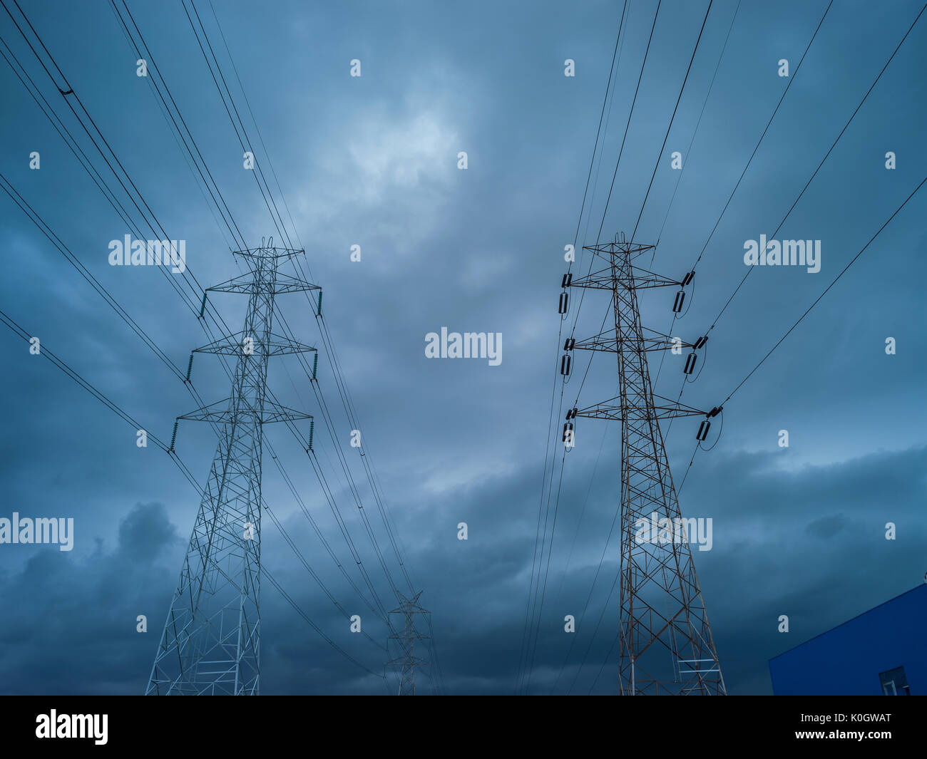 high voltage electric pole in rain storm Stock Photo - Alamy