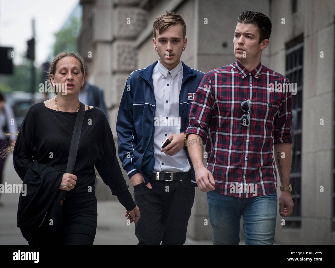 Charlie Alliston, 20 (centre), arrives at the Old Bailey in London ...