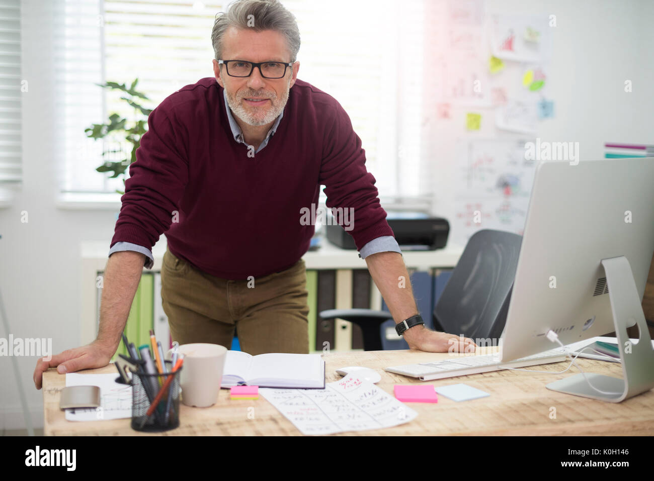 Boss working at his office Stock Photo - Alamy