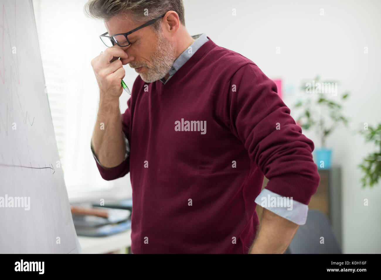 Tired man after a very long day Stock Photo - Alamy