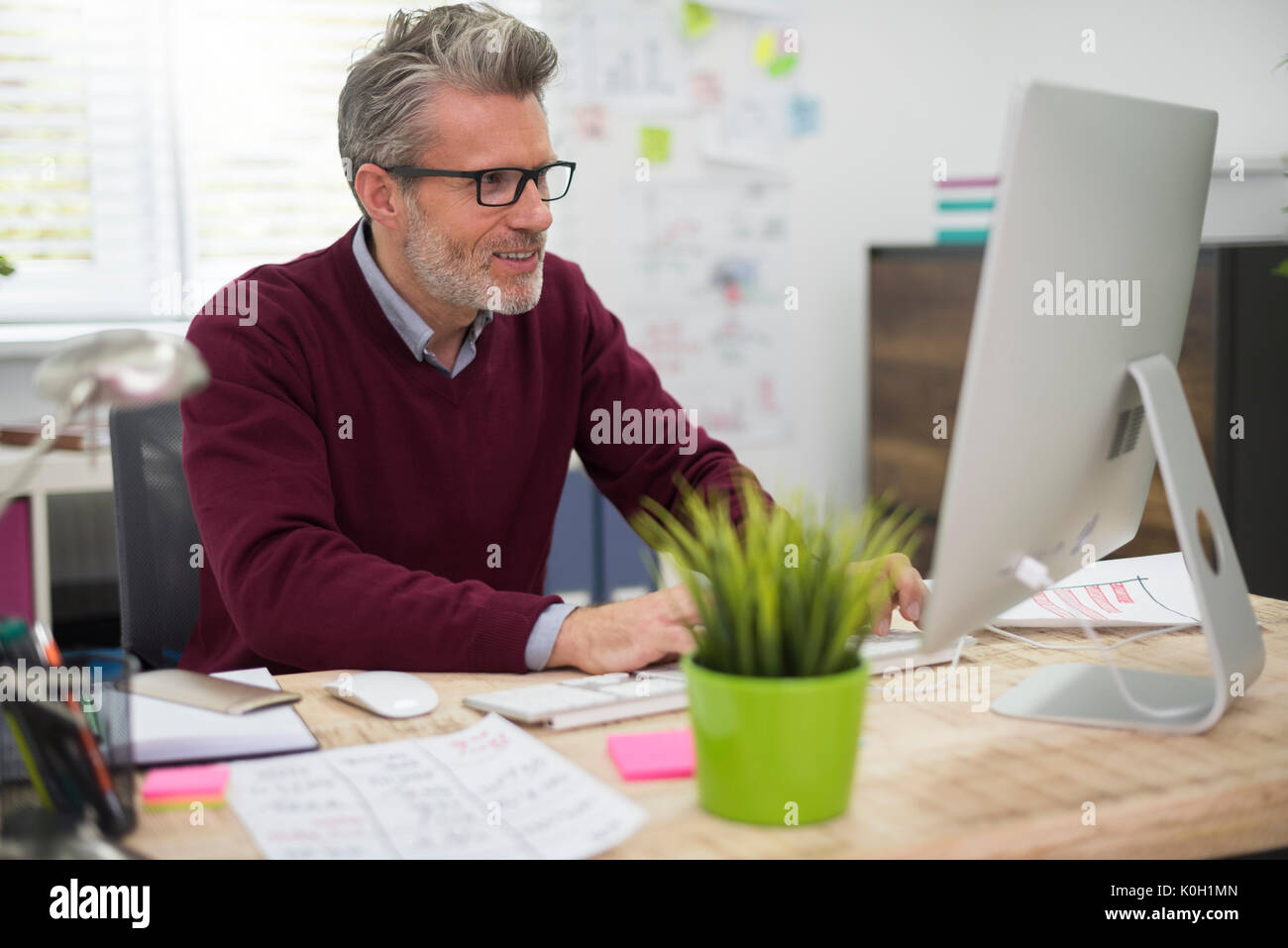 Man using computer back view hi-res stock photography and images - Alamy