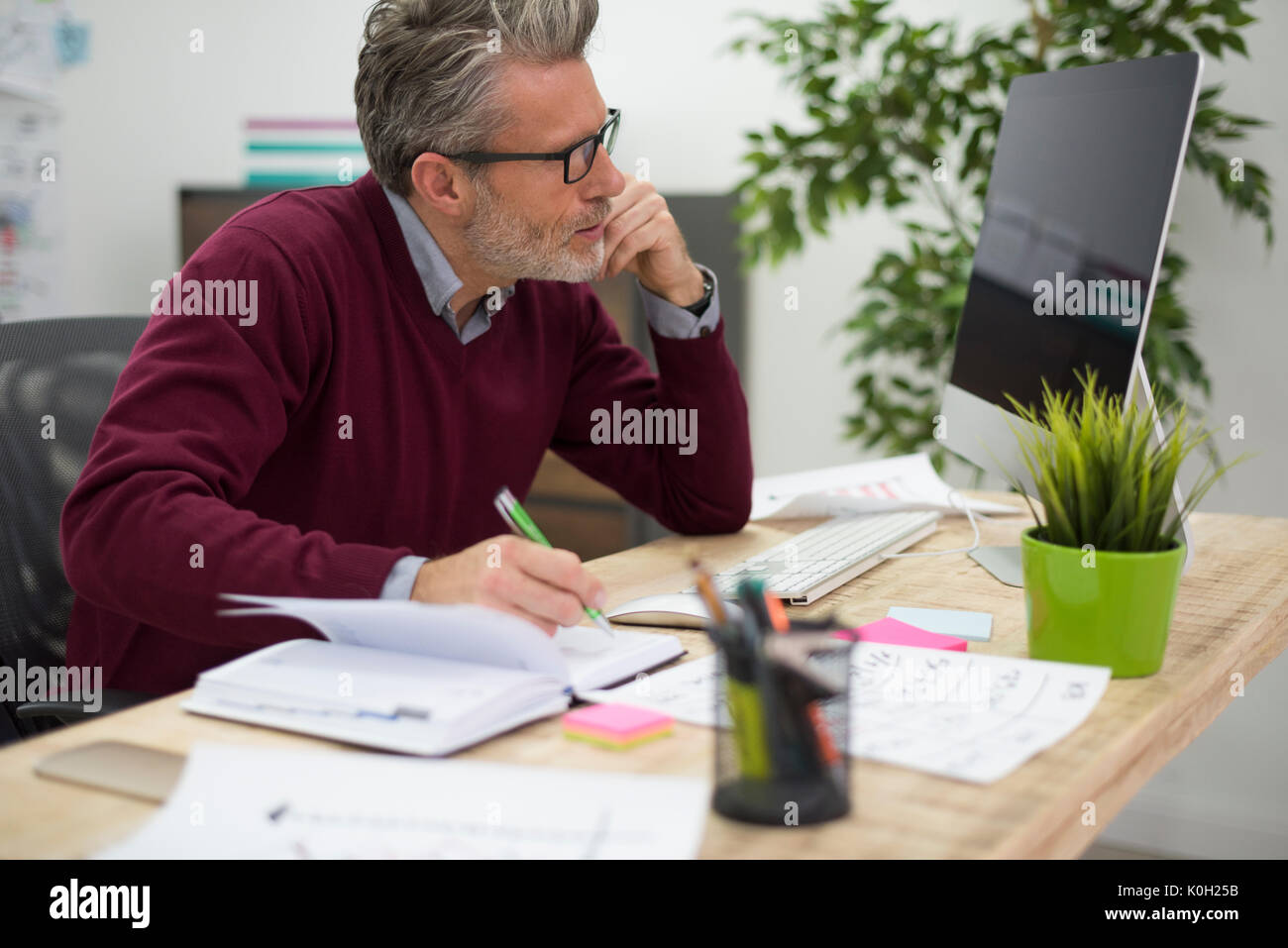 Busy day is normal at this work Stock Photo - Alamy