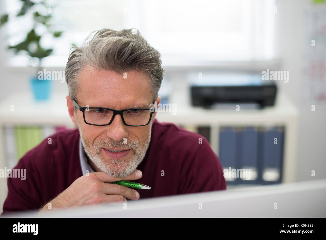 Man using computer back view hi-res stock photography and images - Alamy