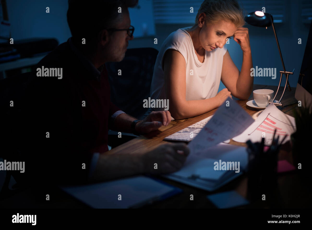 Very tired workers during work at the project Stock Photo - Alamy