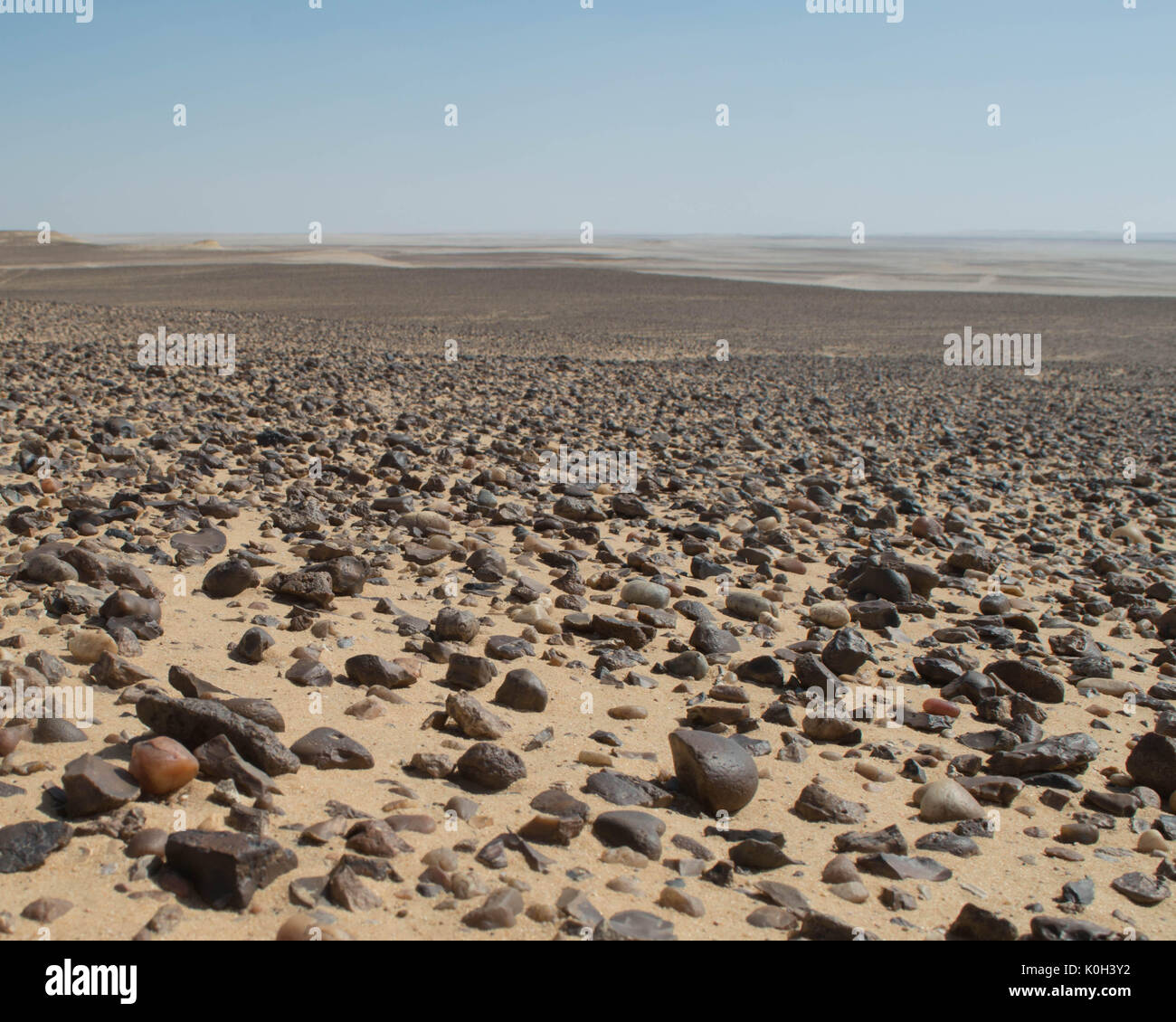 The smoothed over pebbles of the Sahara Desert were once under water ...
