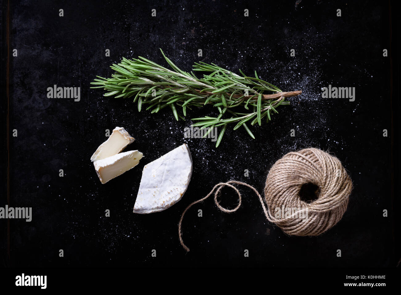 Brie cheese with fresh herbs, swiss appetizer. Top view Stock Photo - Alamy