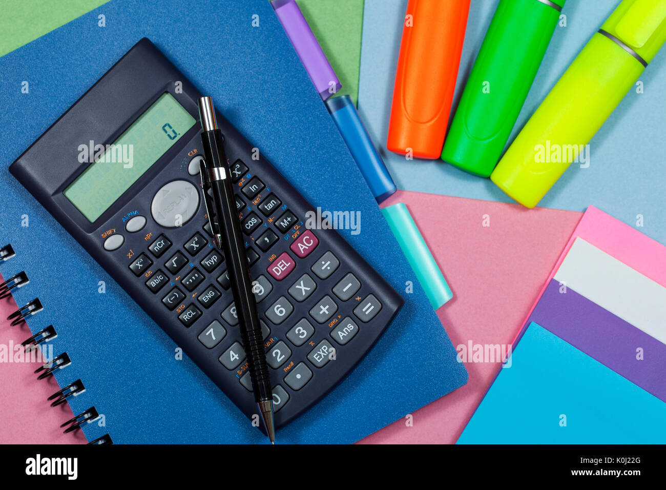 Office calculator book note pad pen hi-res stock photography and images ...