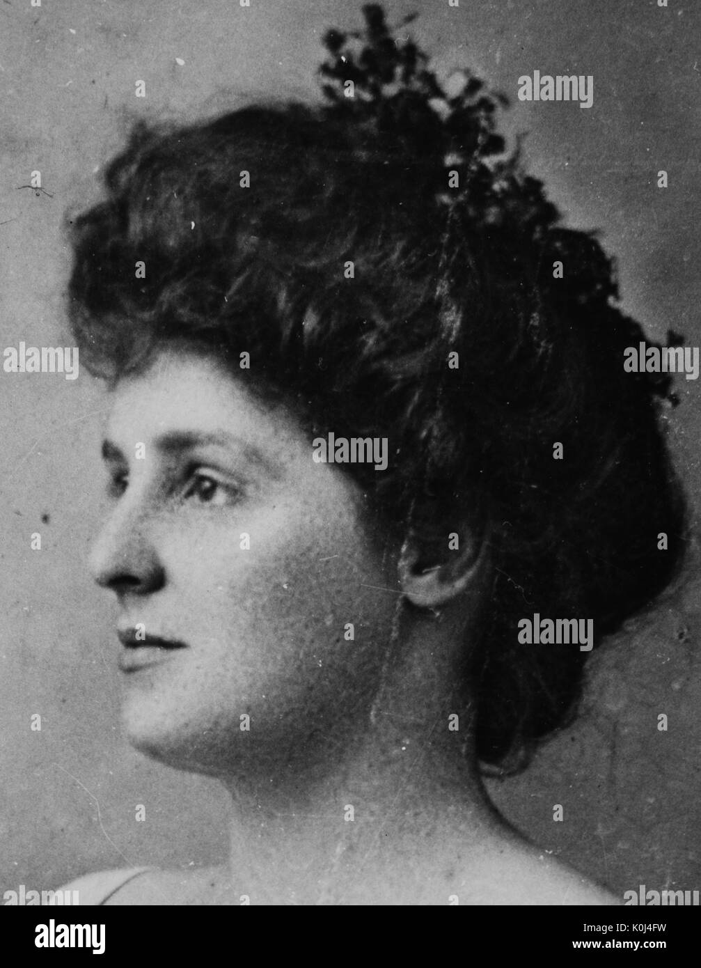 Head shot of Marie Tailer, a profile shot as she is faced to her right ...