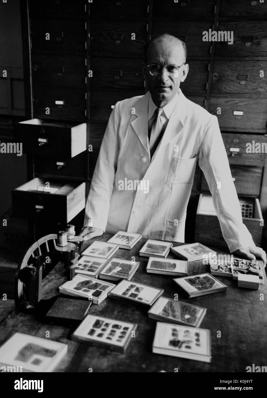 Half-length standing portrait of Italian scientist Franco Rasetti with ...