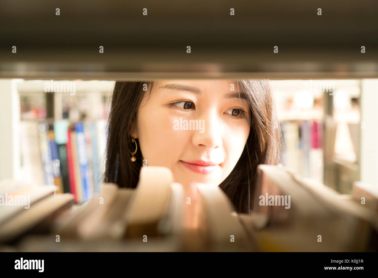 asian girl in library Stock Photo - Alamy
