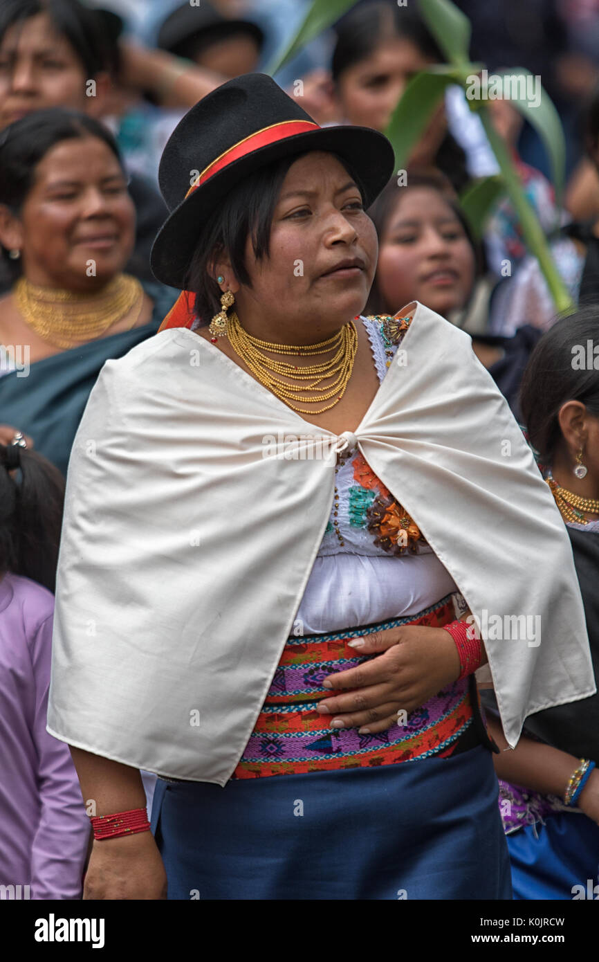 quechua woman in traditional wear in Cotacachi Ecuador during Punchi ...