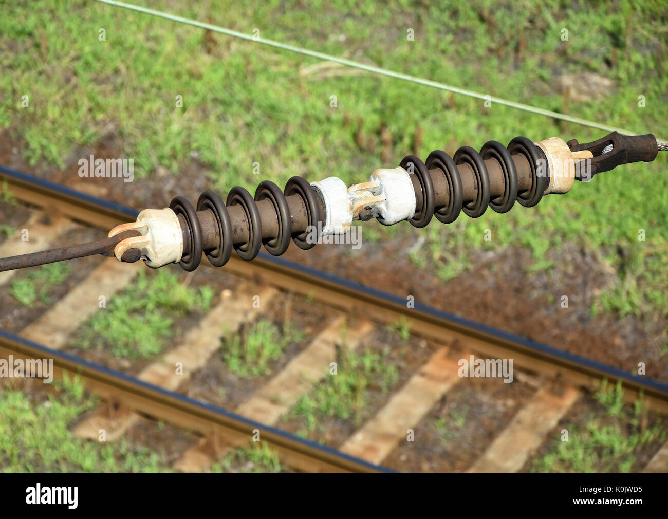 High voltage cable over the railway track Stock Photo - Alamy