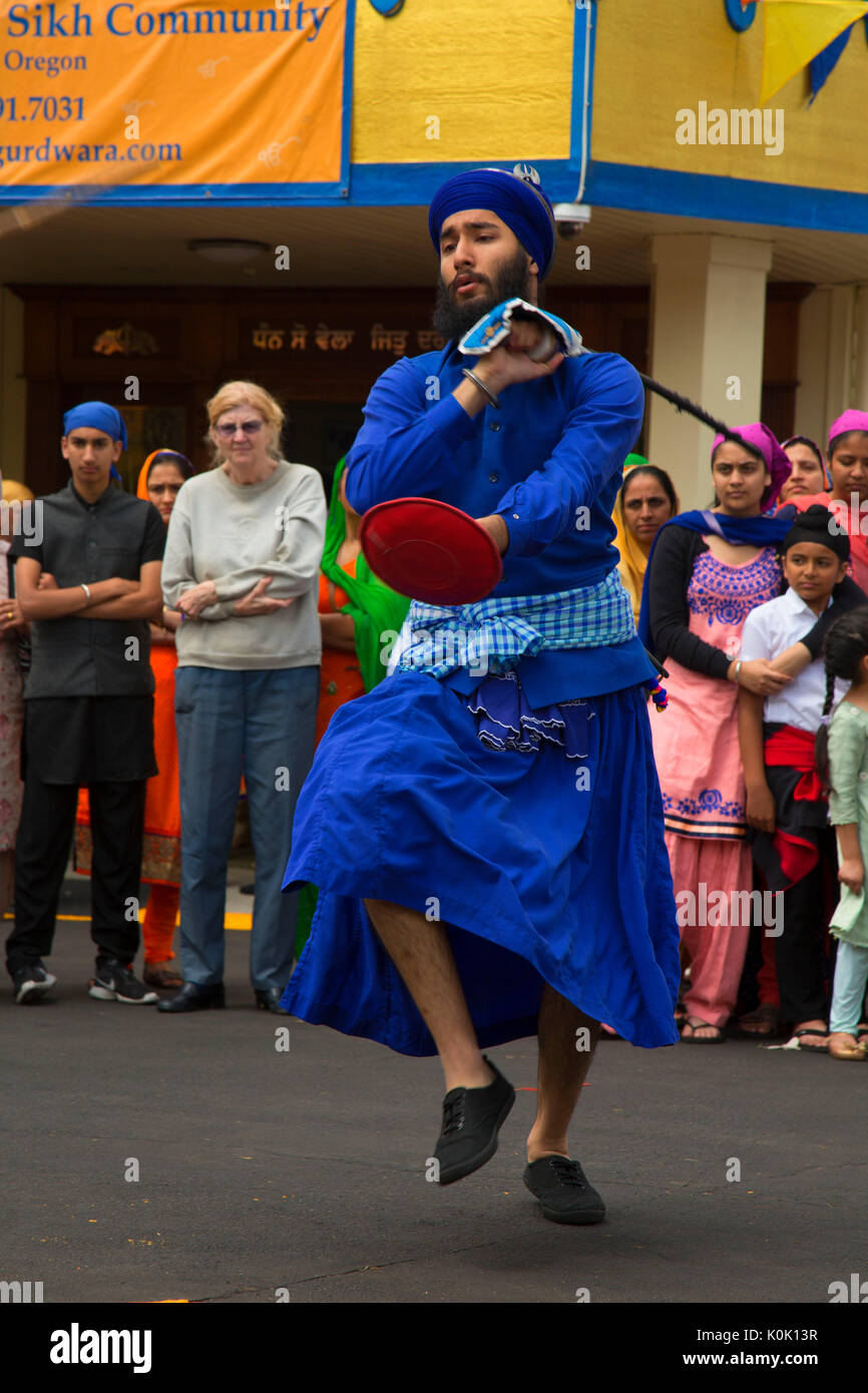 Sikh teen doing Gatka, Sikh Day Parade, Salem, Oregon Stock Photo - Alamy