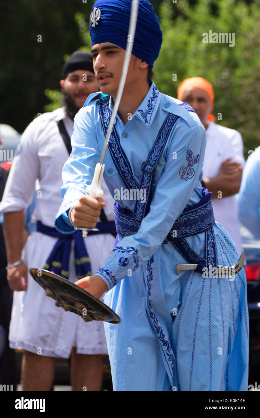 Sikh teen doing Gatka, Sikh Day Parade, Salem, Oregon Stock Photo - Alamy