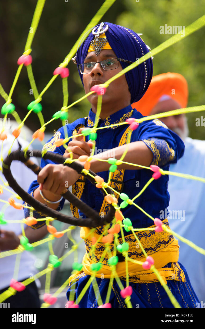 Sikh teen doing Gatka, Sikh Day Parade, Salem, Oregon Stock Photo - Alamy