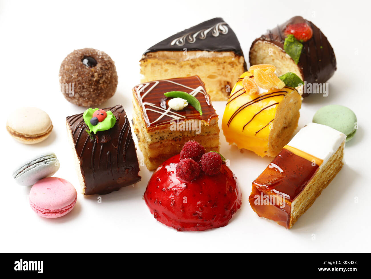 Assorted mini cakes sweet dessert, chocolate and fruit Stock Photo - Alamy