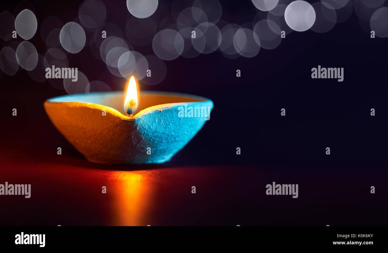 Diwali celebration traditional diya lamp hi-res stock photography and ...
