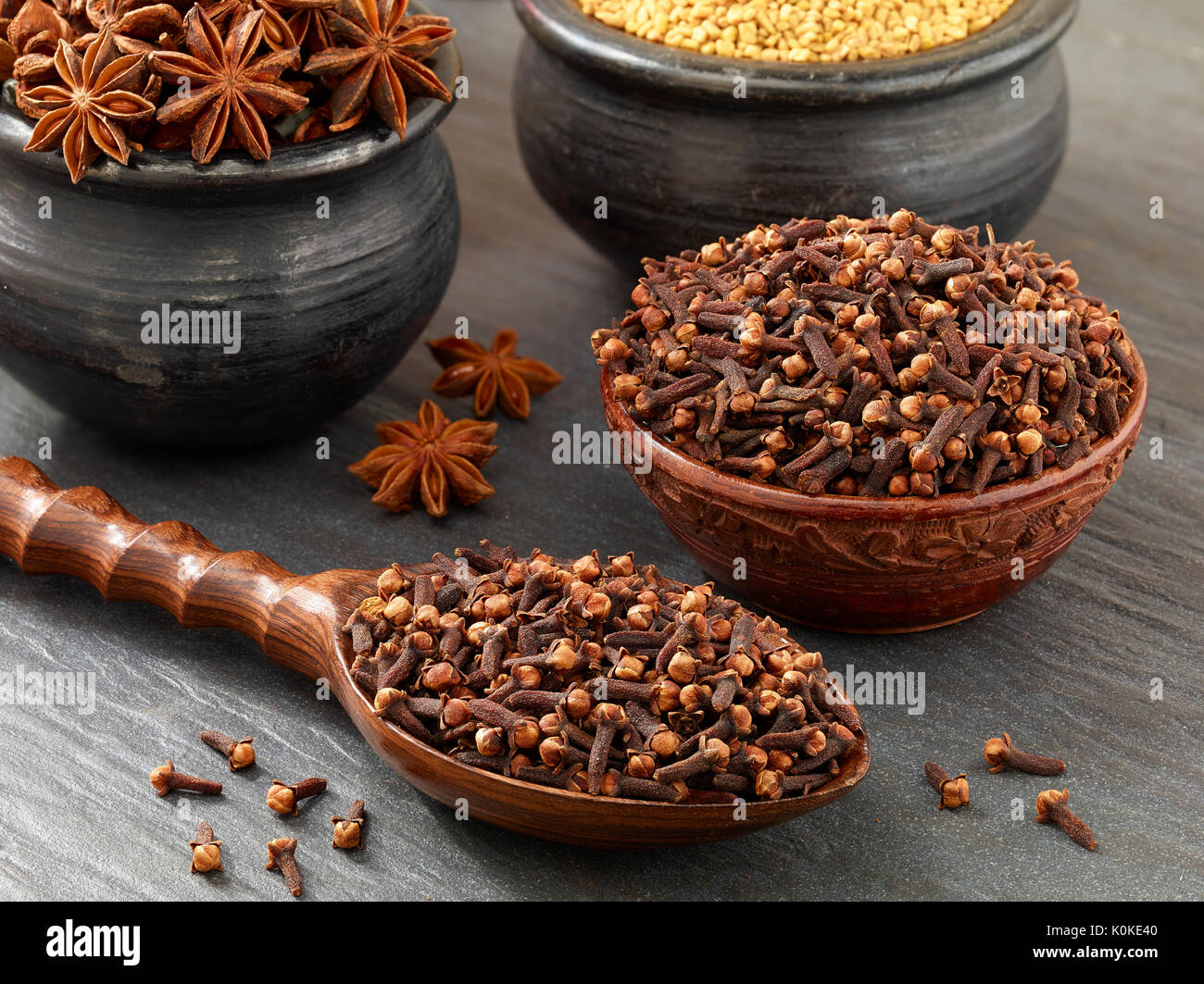 Clove in spoon Stock Photo - Alamy