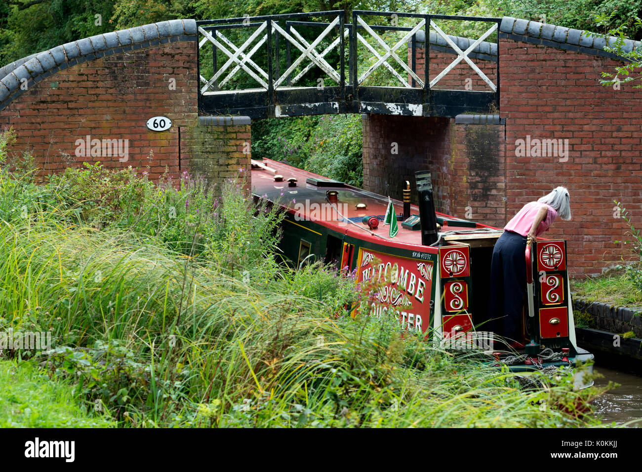 Narrowboat passing under a split bridge on the Stratford-upon-Avon ...