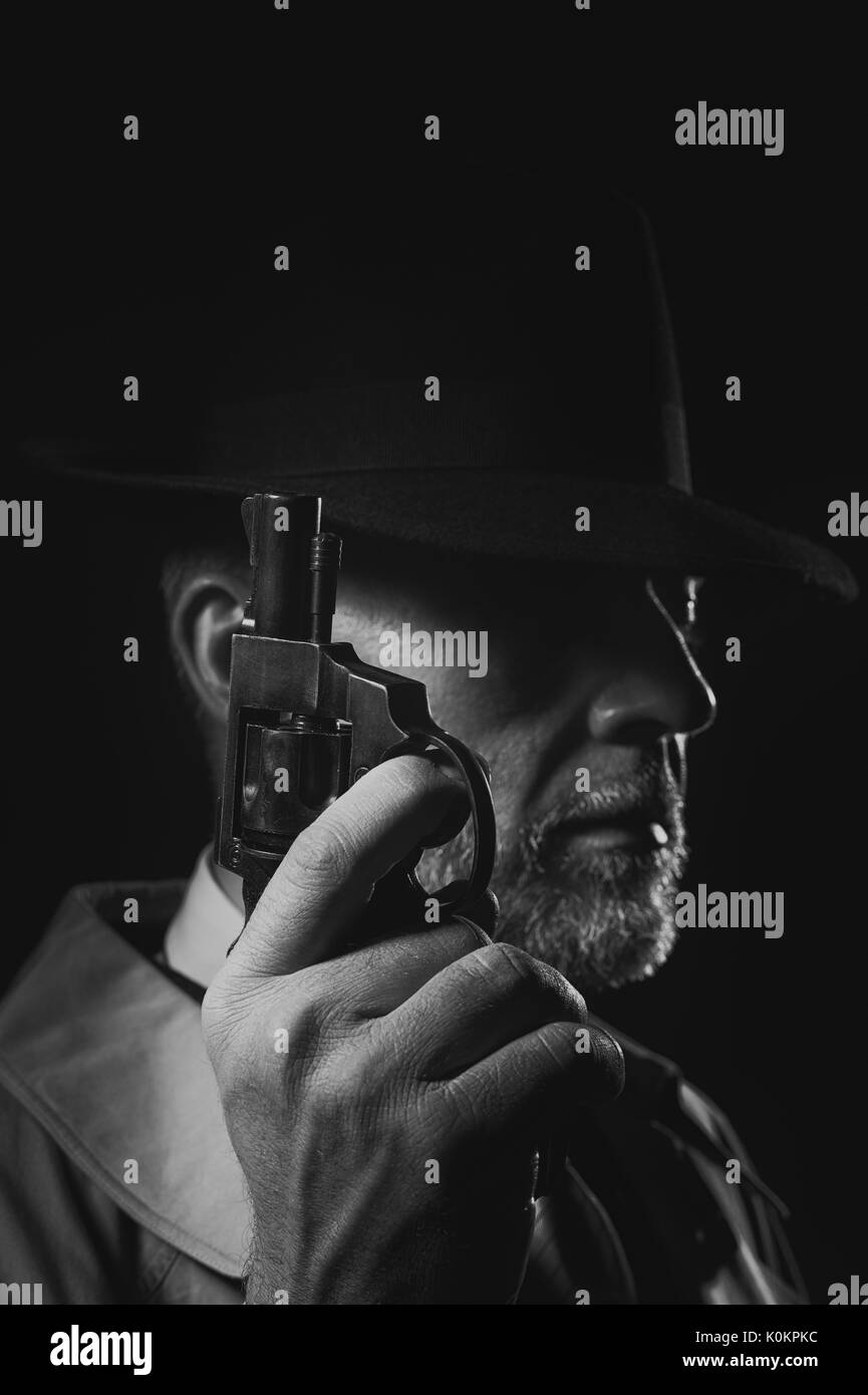 Man wearing vintage hat gun Black and White Stock Photos & Images - Alamy
