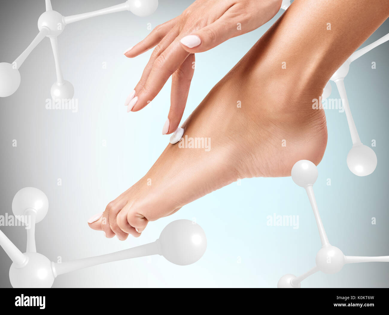 Cosmetic cream on foot among white molecules Stock Photo - Alamy