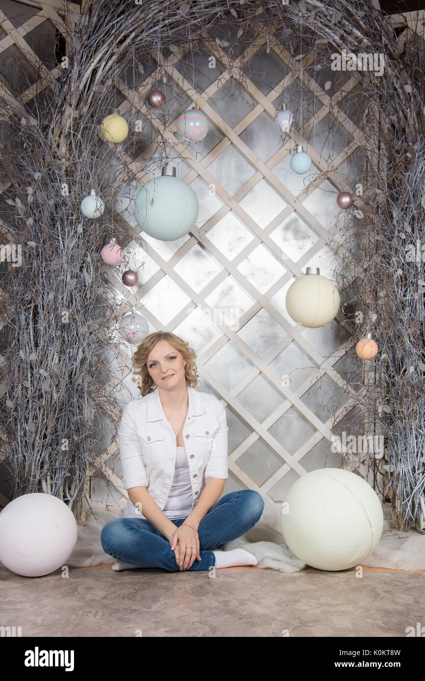 Charming young girl on a studio photo shoot Stock Photo - Alamy