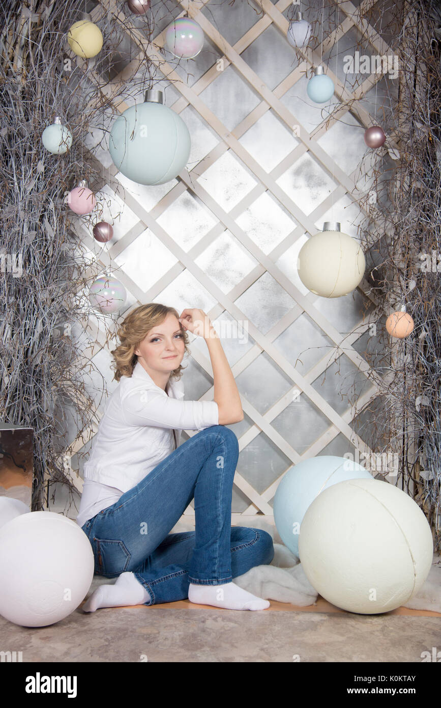 Charming young girl on a studio photo shoot Stock Photo - Alamy
