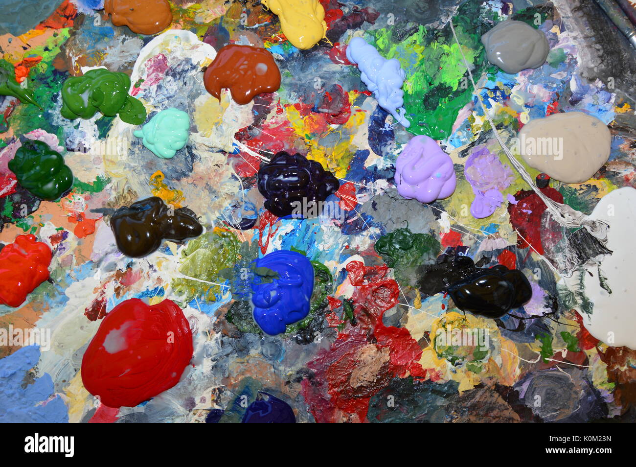 A painter's palette in his workshop Stock Photo - Alamy