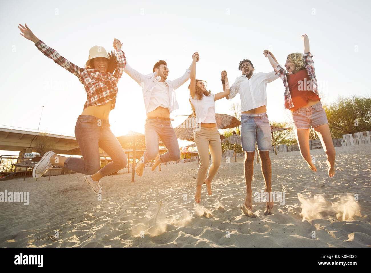 Friends jumping into river hi-res stock photography and images - Alamy