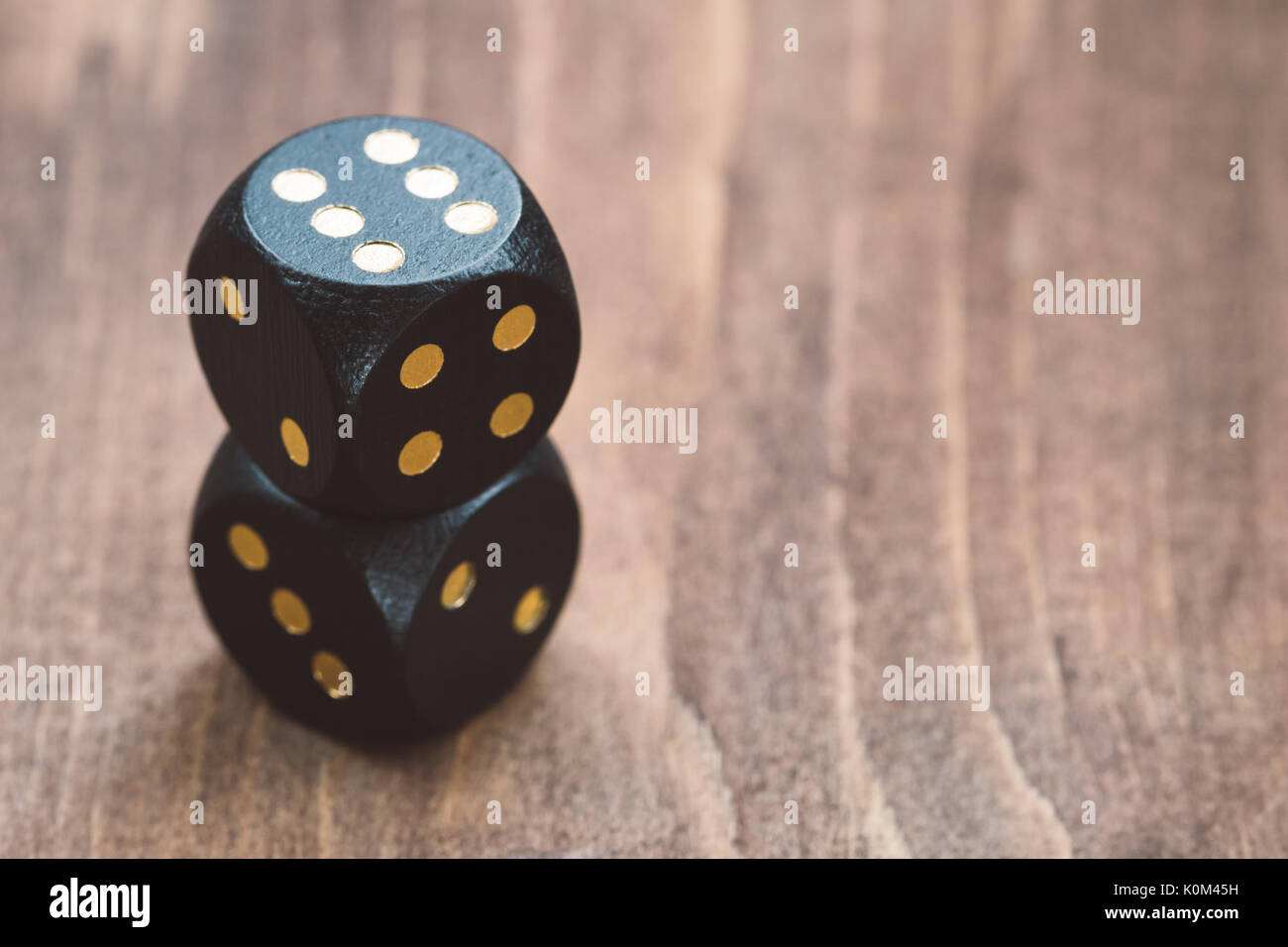 Close up two rolling dice hi-res stock photography and images - Alamy