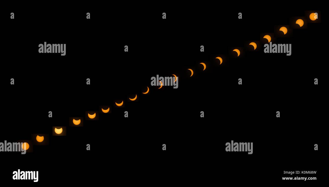 Phases of the partial solar eclipse on black background Stock Photo - Alamy