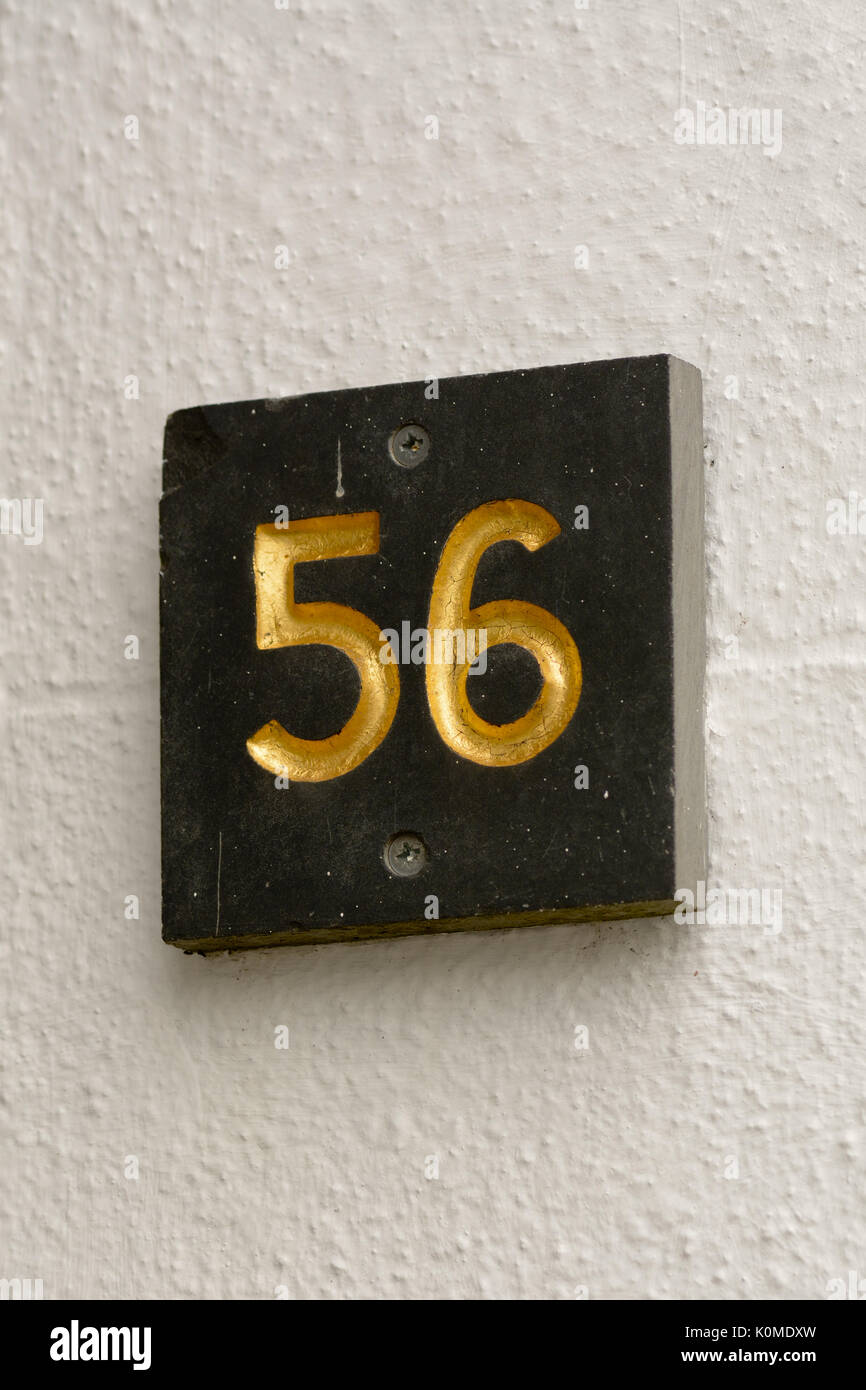 House number 56 sign on wall Stock Photo - Alamy